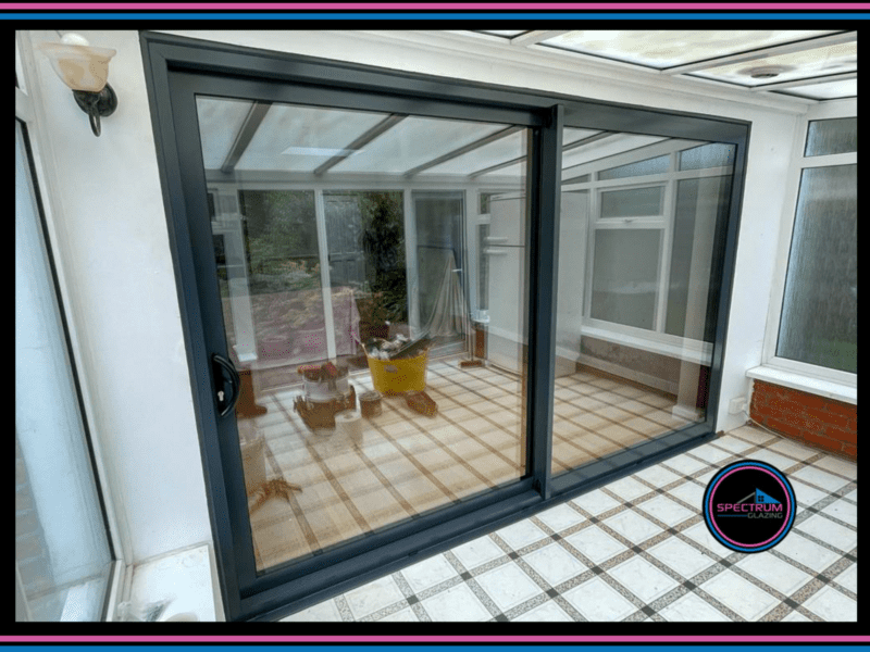 Flat skylight, glass roof & Visoglide aluminium slider - Spectrum Glazing Limited